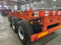 China Large Single Tires With Air Suspension 3 Axles 20ft 40ft 45ft Container Transport Steel Skeleton Semi Trailer for sale