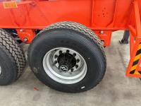 China Large Single Tires With Air Suspension 3 Axles 20ft 40ft 45ft Container Transport Steel Skeleton Semi Trailer for sale