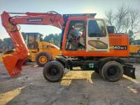 China Second-hand Doosan DH140W-7 Wheeled Excavator Can Operate Flexibly in Narrow Space with Low Oil Consumption. for sale