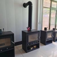 China Domestic Heating Furnace European Cast Iron Fireplace Embedded Firewood Real Fire Heating Fireplace for sale