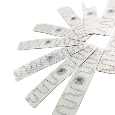 China Water Resistant Washable RFID UHF Laundry Tags 88x4mm with 225 Wash Cycles and 3-Year Lifespan for Textile Management for sale