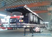 China Carbon Steel Three Axle 50 Ton Flatbed Semi Trailer 13000*2500*1500mm for sale