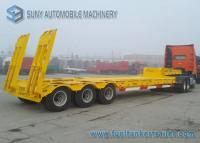 China 3 Axle 100 Ton Low Bed Semi Trailer Heavy Duty Flatbed Trailer With Manual Ramp for sale