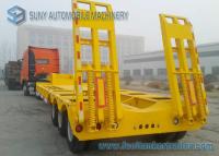 China 3 Axle 100 Ton Low Bed Semi Trailer Heavy Duty Flatbed Trailer With Manual Ramp for sale