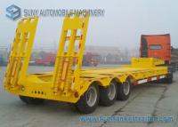 China 3 Axle 100 Ton Low Bed Semi Trailer Heavy Duty Flatbed Trailer With Manual Ramp for sale