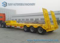 China 3 Axle 100 Ton Low Bed Semi Trailer Heavy Duty Flatbed Trailer With Manual Ramp for sale