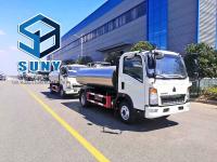 China 5000 L HOWO Smaller Stainless Steel Water Tanker Truck 4x2 Milk Tanker Transport Vehicle for sale