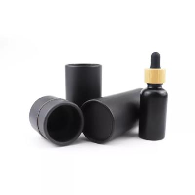 China Custom Black Cardboard Tube Boxes for Essential Oil Dropper Bottles 500pcs MOQ for sale