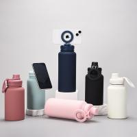 China Sports Insulated Stainless Steel Water Bottle with Cell Phone Mount Stand Magnetic Holder Sustainable for sale