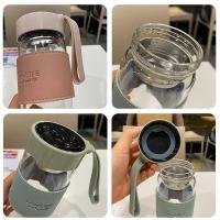 China 480ml Custom Borosilicate Glass Water Bottle with Leather Sleeve and Tea Infuser for sale