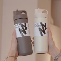 China 304 Stainless Steel Japandi Design Style 550ml Double Wall Vacuum Flask With Handle for sale