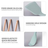 China Wooden Handle 19-Piece Silicone Kitchen Utensil Set with Cutting Board Storage Bucket for sale