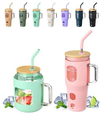 China Custom Logo Reusable Glass Tumbler 32oz with Bamboo Lid Handle and Silicone Sleeve for sale