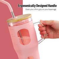 China Custom Logo Reusable Glass Tumbler 32oz with Bamboo Lid Handle and Silicone Sleeve for sale