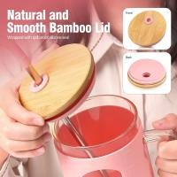 China Custom Logo Reusable Glass Tumbler 32oz with Bamboo Lid Handle and Silicone Sleeve for sale