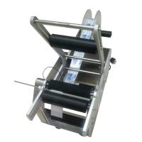 China Semi Automatic Packaging Labeling Machine , Small Bottle Labeler For Round Bottles for sale