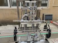 China Beverage Liquid Filling Packaging Machine , Automatic Liquid Bottle Filler 4 Nozzles for sale