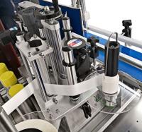 China the lower price and hot sale tabletop automatic labeling machine for round bottle for sale