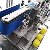 China the lower price and hot sale tabletop automatic labeling machine for round bottle for sale