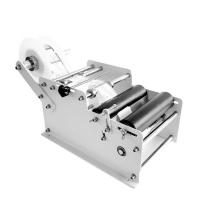 China Multipurpose Manual Sticker Labeling Machine For Round Bottle for sale
