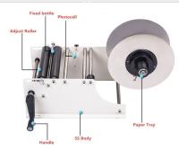 China Multipurpose Manual Sticker Labeling Machine For Round Bottle for sale