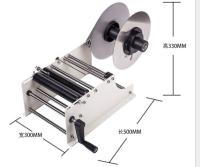 China Multipurpose Manual Sticker Labeling Machine For Round Bottle for sale