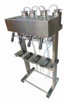 China Semi Automatic Pneumatic Perfume Bottle Filling Machine With 4 Filling Heads for sale