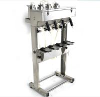 China Semi Automatic Pneumatic Perfume Bottle Filling Machine With 4 Filling Heads for sale