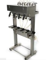 China Semi Automatic Pneumatic Perfume Bottle Filling Machine With 4 Filling Heads for sale