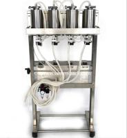 China Semi Automatic Pneumatic Perfume Bottle Filling Machine With 4 Filling Heads for sale