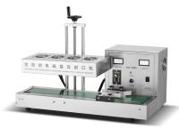 China Tabletop Automatic Vertical Sealing Machine For Cosmetic Glass Jars Aluminium Foil for sale