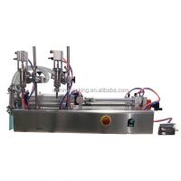 China Full Pneumatic Double Head Table Top Liquid Filling Machine with 1% Filling Accuracy for sale