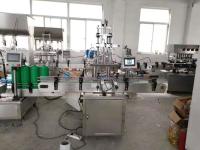 China Automatic Pistons Liquid Bottle Filling Capping And Labeling Machine for sale