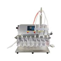 China 220V Double Nozzles Liquid Water Spout Pouch Bag Filling Machine With Stand Up Nozzle Bag Semi Automatic Filler And Sealer for sale