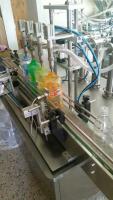 China Hot Sale Automatic Piston Lube Oil Filler Bottle Liquid Filling Capping and Labeling Machine for sale