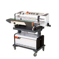 China Vertical Continuous Air Suction Band Vacuum Sealer With Date Printing for sale