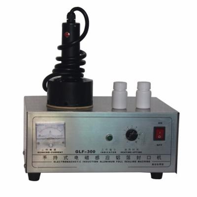 China New Type GLF-300 Induction Aluminum Foil Sealing Machine , Plastic Screw Thread Sealer , Portable Round Bottle Lid Sealer for sale