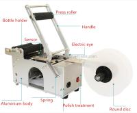 China New Design Oval Bottle Labeling Machine for Cosmetic Bottle for sale