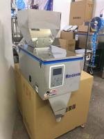 China 100-5000G Semi-Automatic Packing Machine/Particle Filling Machine Price/Granule/Powder Weighing and Filling Machine for sale
