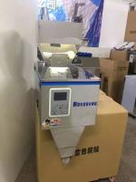 China 100-5000G Semi-Automatic Packing Machine/Particle Filling Machine Price/Granule/Powder Weighing and Filling Machine for sale