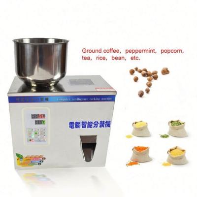 China Hot Sale FZ-100 Dry Tea,Powder,Seeds,Grain Weighing Filling Machine 2-100g for sale
