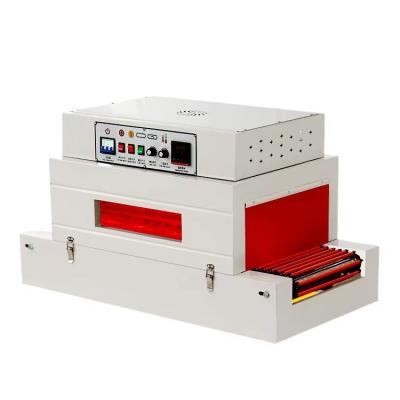 China Heat Shrink Wrapping Packaging Machine for PVC POF PP Transparent Plastic Film for sale