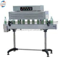 China Semi Automatic Bottle Cap Plastic Film Shrink Wrap Machine for sale
