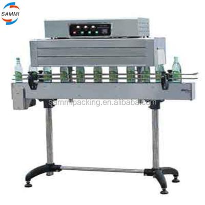 China Semi Automatic Bottle Cap Plastic Film Shrink Wrap Machine for sale