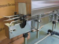 China Semi Automatic Bottle Cap Plastic Film Shrink Wrap Machine for sale
