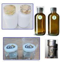 China Semi Automatic Bottle Cap Plastic Film Shrink Wrap Machine for sale