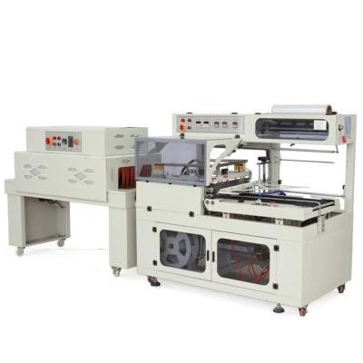 China FQL5545+BSD-4522N Wrapping Film Packing Machine for Cosmetic Box/Bottle for sale