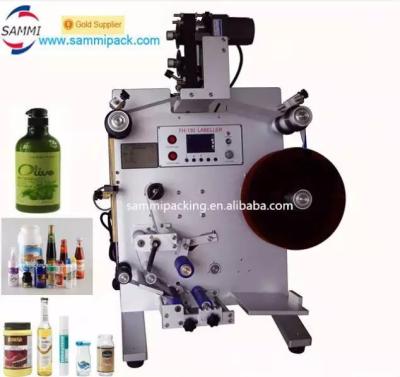 China SL-130 Verital Round Bottle Labeller,Adhesive Stickers Labeling Machine for Round Bottles for sale