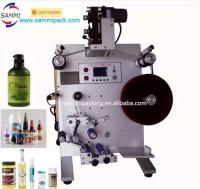 China SL-130 Verital Round Bottle Labeller,Adhesive Stickers Labeling Machine for Round Bottles for sale