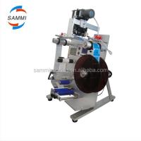 China SL-130 Verital Round Bottle Labeller,Adhesive Stickers Labeling Machine for Round Bottles for sale